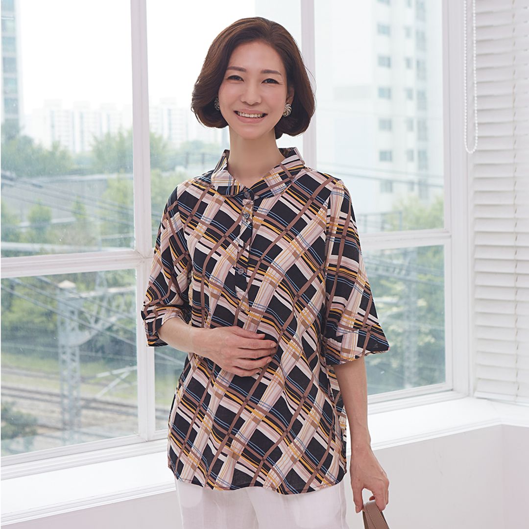 포스티 바네사리찌 인견 라운드 카라 블라우스